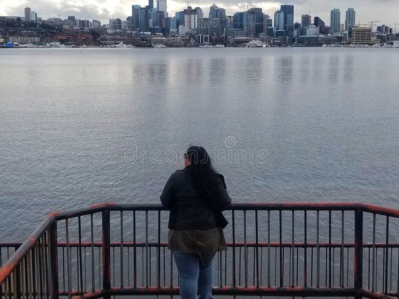 Woman Looking at Seattle Skyline from Gas Works Park in Seattle, Ohio ...
