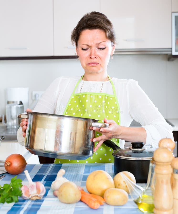 Woman Looking at Spoiled Food in Kitchen Stock Photo - Image of odour ...