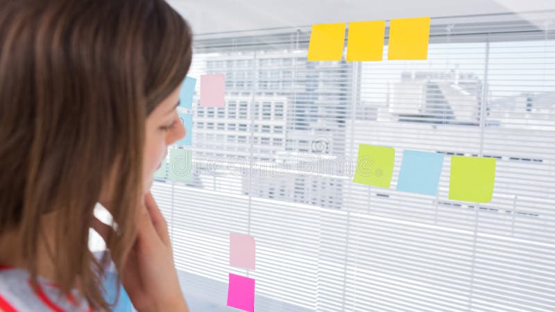Woman Looking at Sticky Note Stock Image - Image of female, note: 31099313