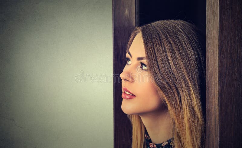 352 Woman Looking Behind Door Stock Photos - Free & Royalty-Free Stock ...