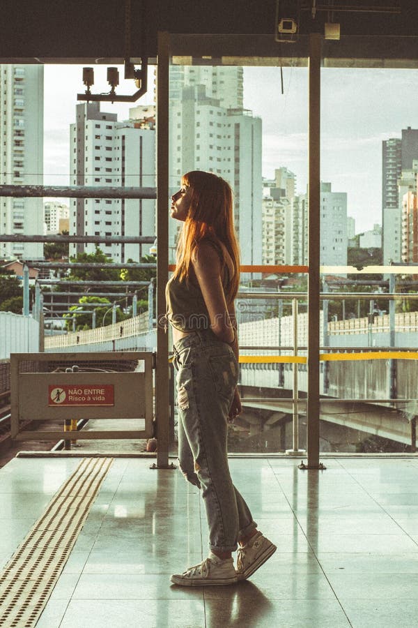 Woman Looking Through Window Stock Image - Image of buildings ...