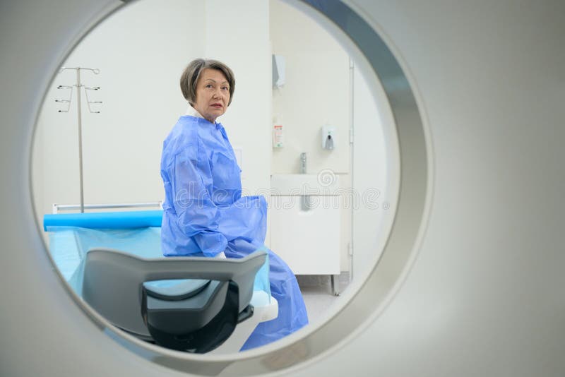 Woman Looks into the Camera of a Modern CT Machine Stock Photo - Image ...