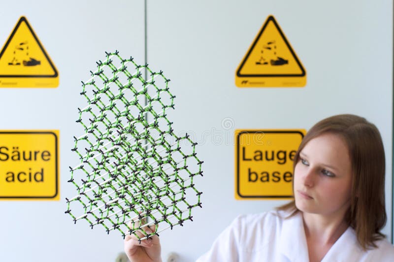 Woman Looks Molecule Model Stock Photos - Free & Royalty-Free Stock ... Woman Looks Molecule Model Stock Photos - Free & Royalty-Free Stock ...