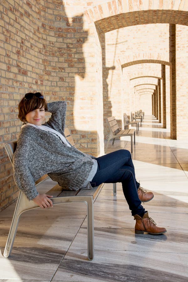 Woman in Love Posing on a Bench Stock Photo - Image of denim, looking ...