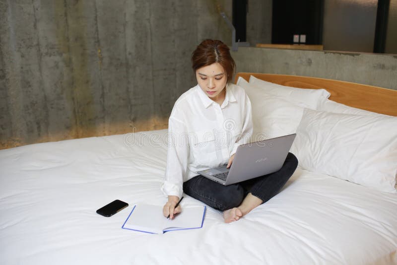 Woman Lying on the Bed Work at Home Stock Photo - Image of beautiful ...
