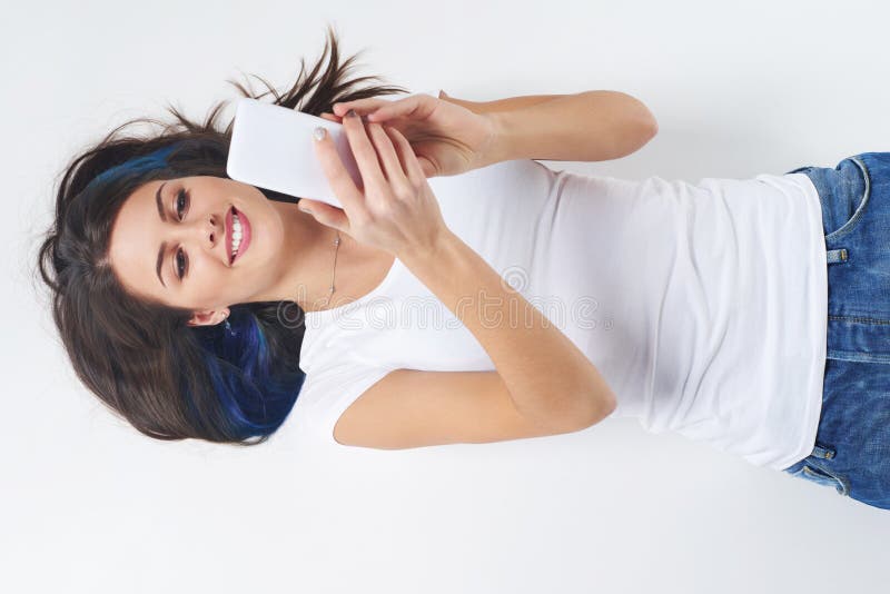 Woman Lying on Her Back and Using Phone Stock Image - Image of adult ...