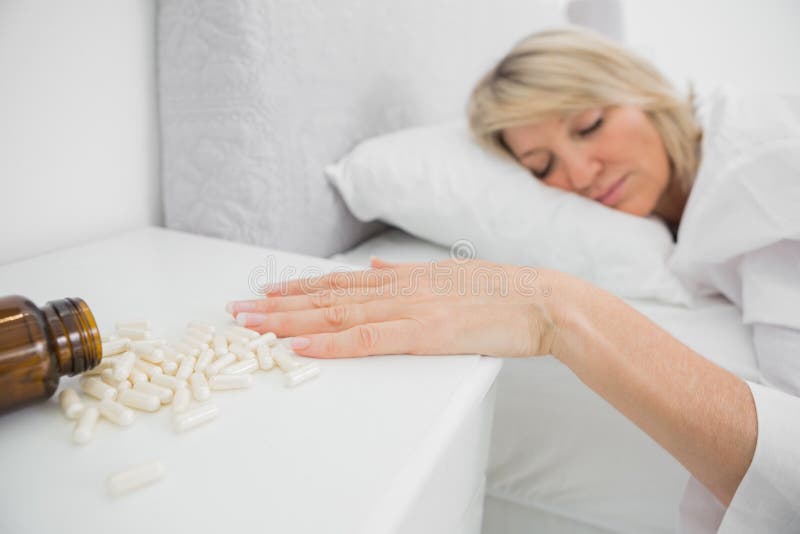 Woman Lying Motionless beside Pills Stock Image - Image of short ...
