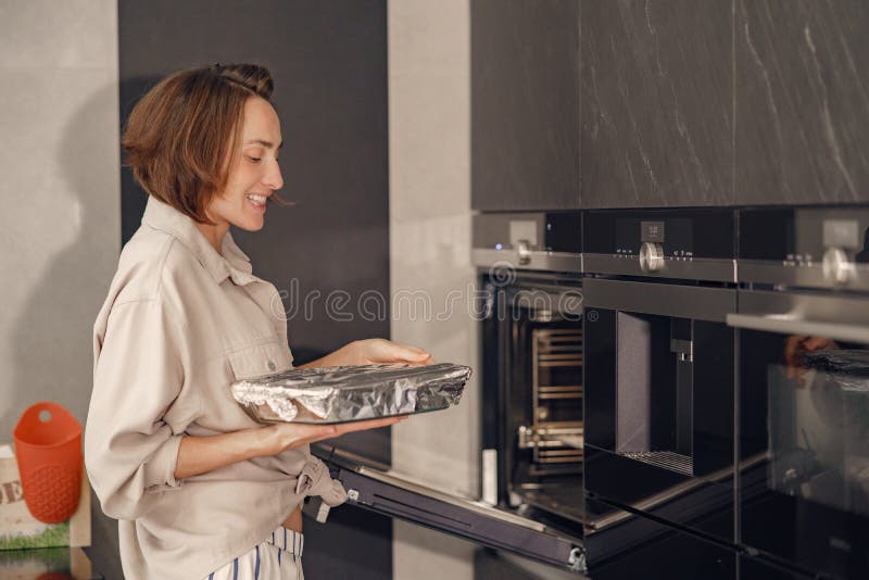Woman Make a Dinner in the Kitchen at Home Stock Image - Image of ...