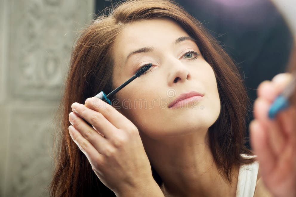 Woman Makes Light Day Makeup in Bathroom. Stock Image - Image of home ...