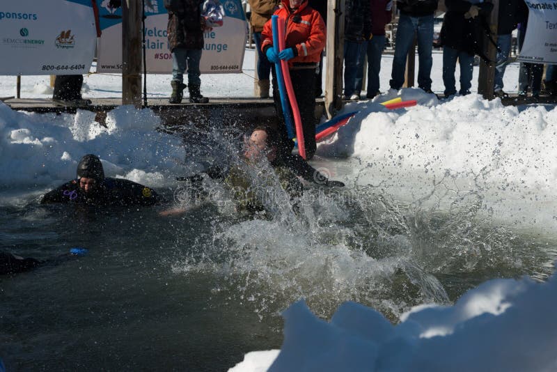 Woman Makes a Splash at the 2014 Polar Plunge Editorial Photography ...