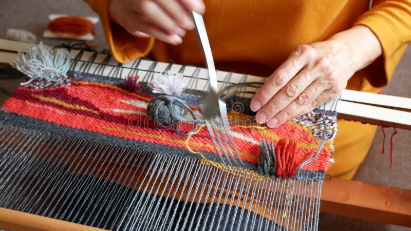 Woman Makes a Weaving Project Using Just a Fork, No Special Tapestry ...