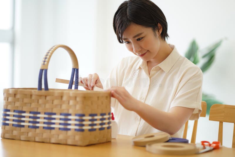 A Woman Making a Basket with a Craft Band Stock Photo - Image of asia ...