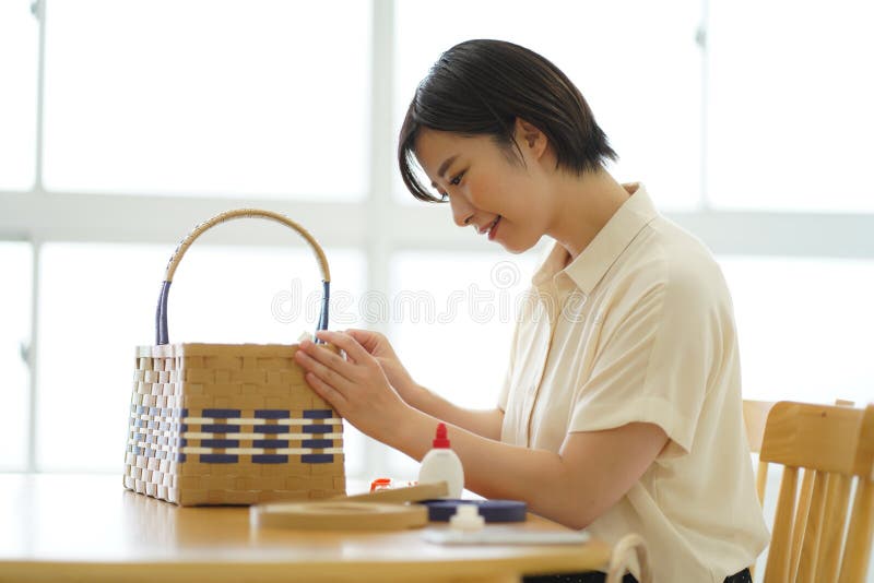 A Woman Making a Basket with a Craft Band Stock Image - Image of bond ...