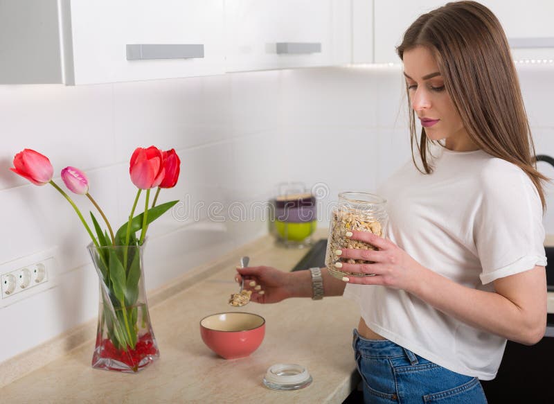 Woman making breakfast stock photo. Image of kitchen - 91029890