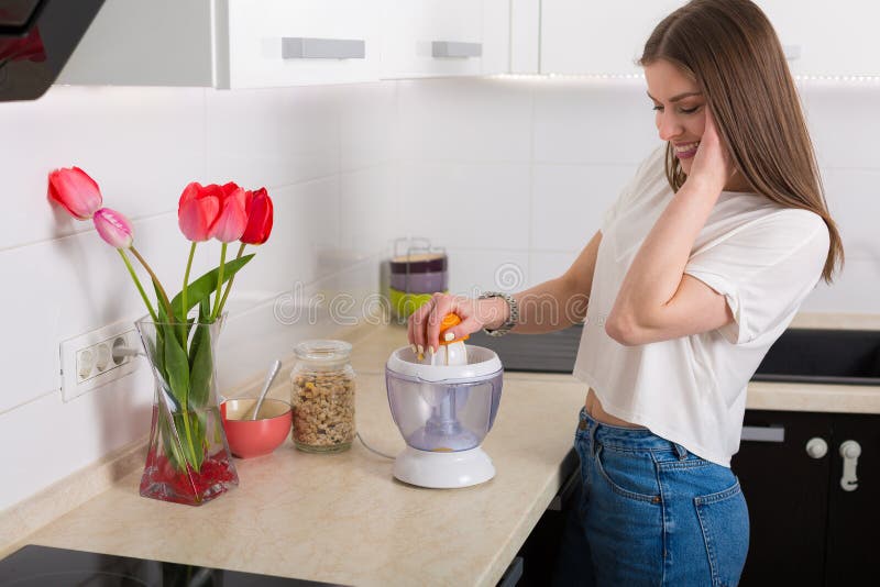 Woman making breakfast stock image. Image of juice, apartment - 91030035