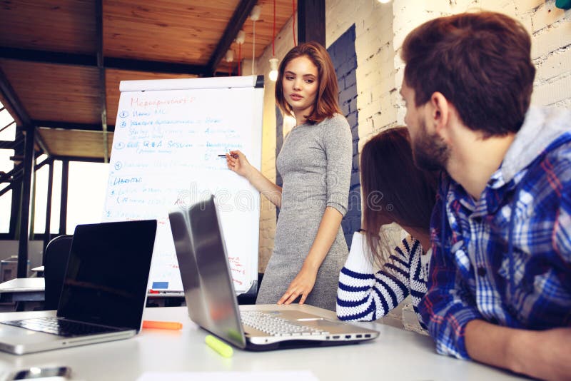 Woman Making a Business Presentation Stock Photo - Image of group, guys ...