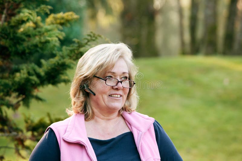Woman making calls outside stock image. Image of adult - 23083219