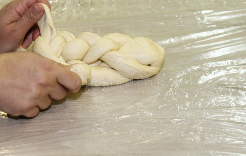 Woman making a challa stock photo. Image of loaf, hashanah - 73024976