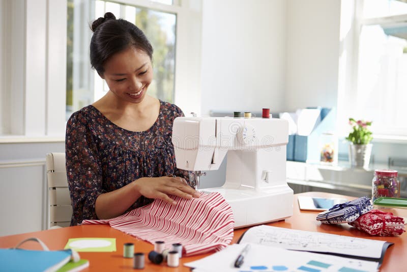 Woman Making Clothes Using Sewing Machine at Home Stock Image - Image ...