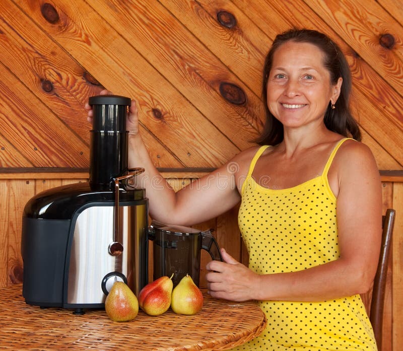 Woman making fresh juice stock photo. Image of appetizer - 22546806