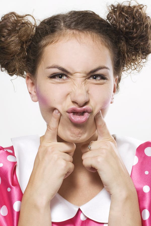 Woman making a funny face stock photo. Image of grimace - 15211068
