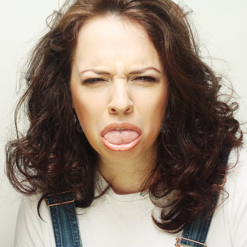 Woman making a funny face stock image. Image of indoor - 130801303