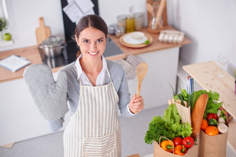 Woman Making Healthy Food Standing Smiling in Kitchen Stock Photo ...