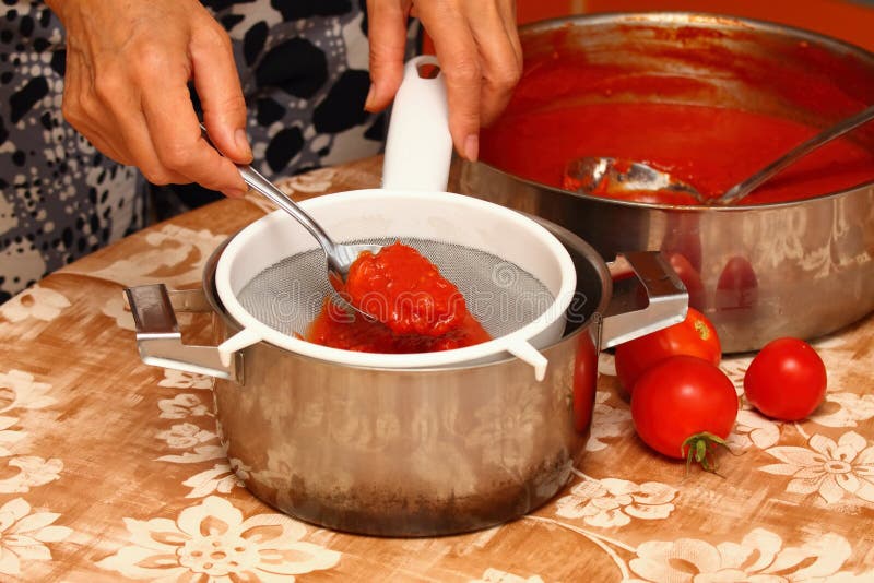 Woman making ketchup stock image. Image of ketchup, kitchen - 77646449