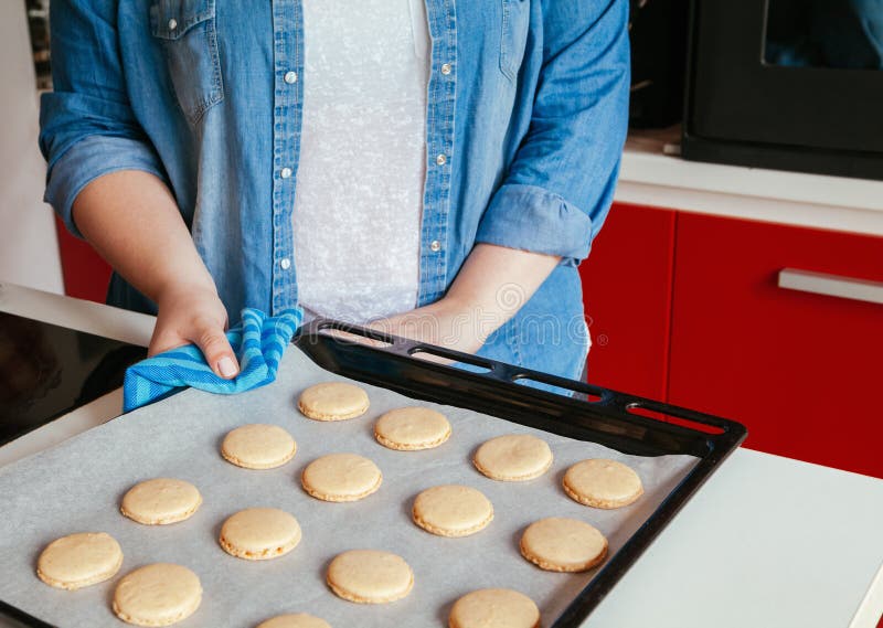 Woman Making Macarons stock photo. Image of gourmet, domestic - 89130962
