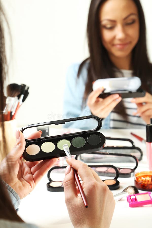 Woman making make-up stock image. Image of fashion, care - 95022623
