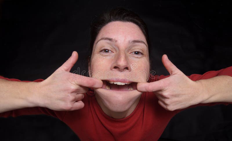 Woman making mockery stock image. Image of mouth, interior - 140140783