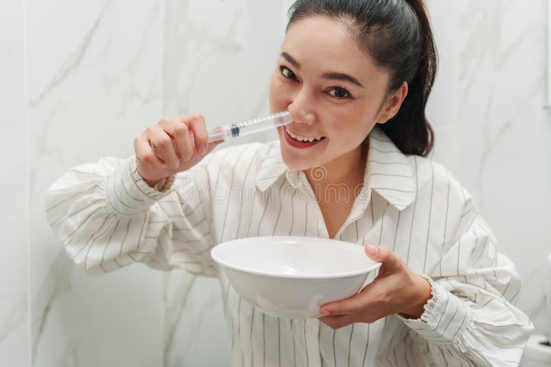 Woman Making Nasal Wash with Using Sryinge Flushing Inside Nose Stock ...