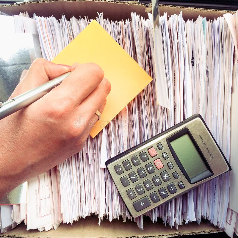 Woman making a note editorial stock image. Image of calculator - 44658429