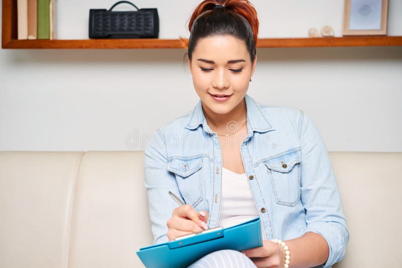 Woman Making Notes in Document Stock Image - Image of education, indoor ...