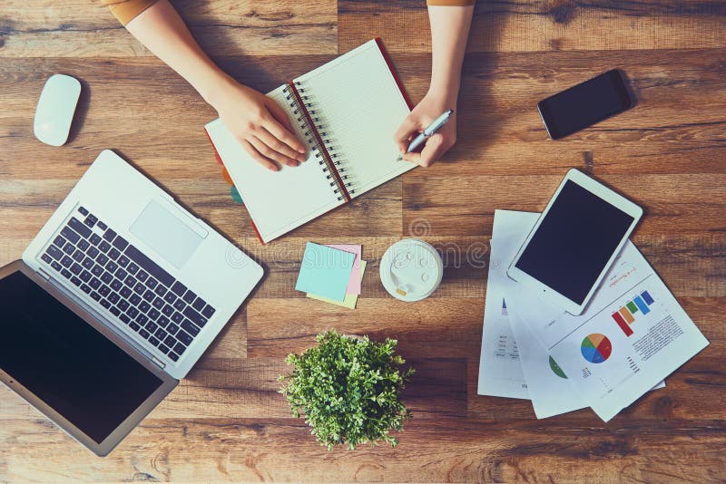 Woman making notes stock image. Image of consultant, angle - 75424669