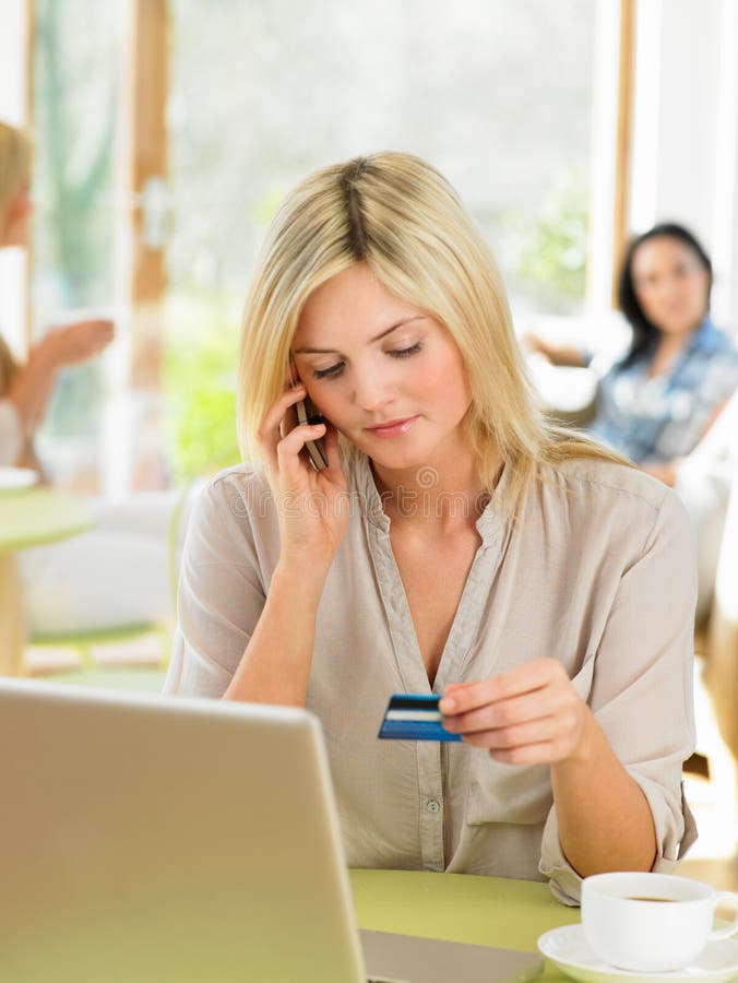 Woman Making Online Purchase in Cafe Stock Photo - Image of phone ...