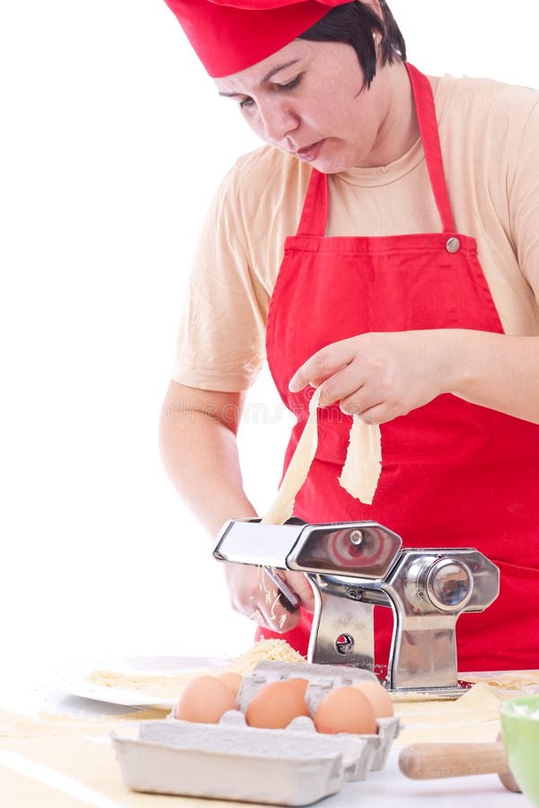 Woman making pasta stock photo. Image of machine, traditional - 21924820