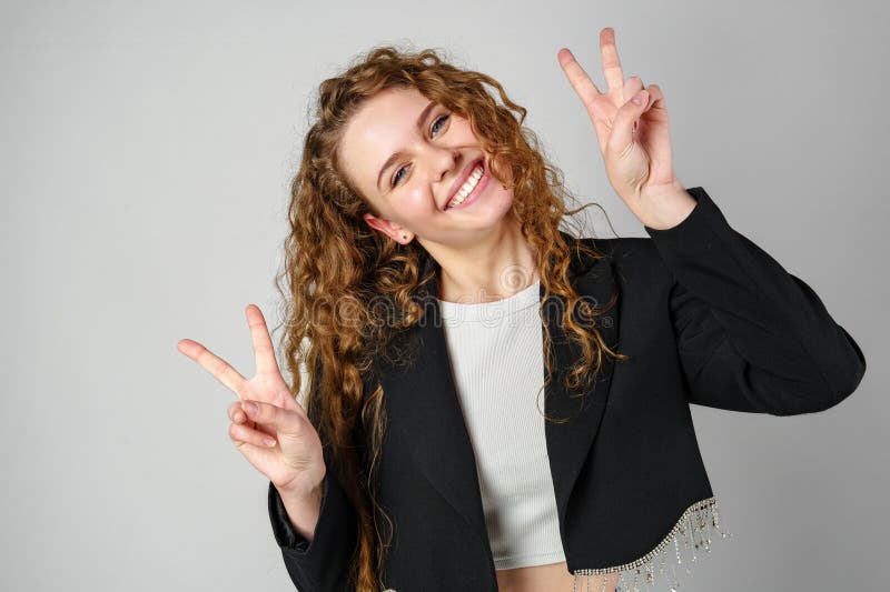 Woman Making a Peace Sign with Hands Stock Photo - Image of confident ...