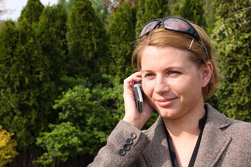 Woman making a phone call stock image. Image of lifestyle - 5405457