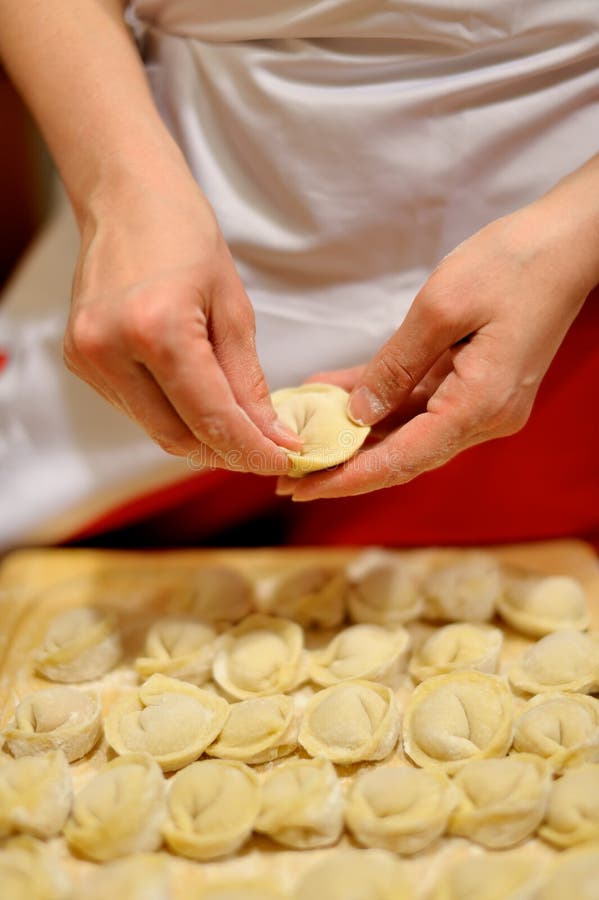 Woman Making Russian Dumplings (pelmeni) Stock Photo - Image of food ...