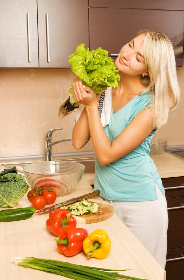 Woman making salad stock photo. Image of cook, beauty - 6010120