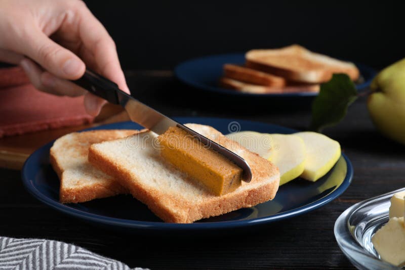 Woman Making Sandwich with Quince Paste at Table, Closeup Stock Photo ...