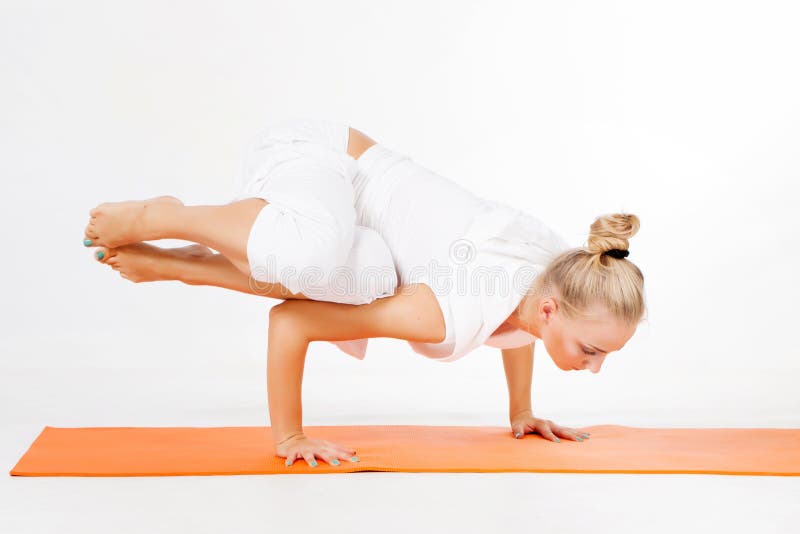 Woman making yoga figure stock image. Image of beautiful - 64277965