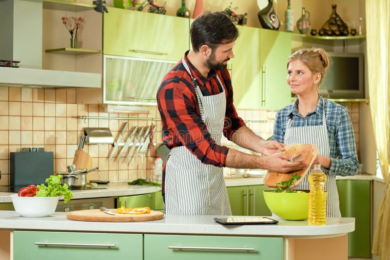 Woman and man cooking. stock image. Image of bowl, food - 101891967