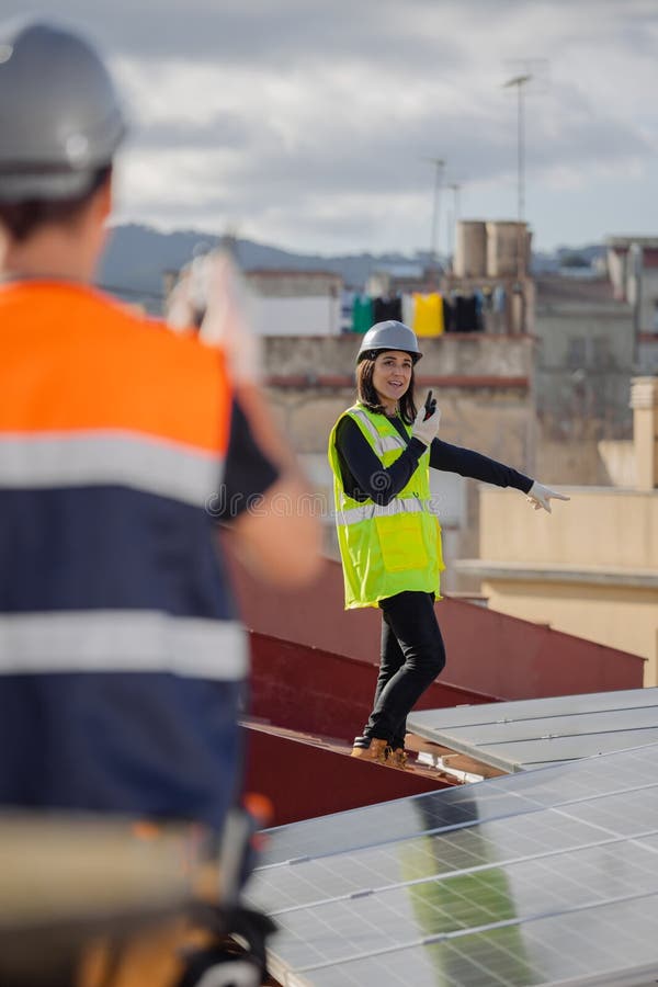 Woman and Man Engineer Technicians Doing Maintenance Service Solar ...