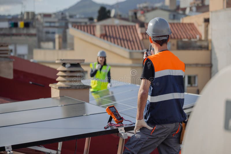 Woman and Man Engineer Technicians Doing Maintenance Service Solar ...