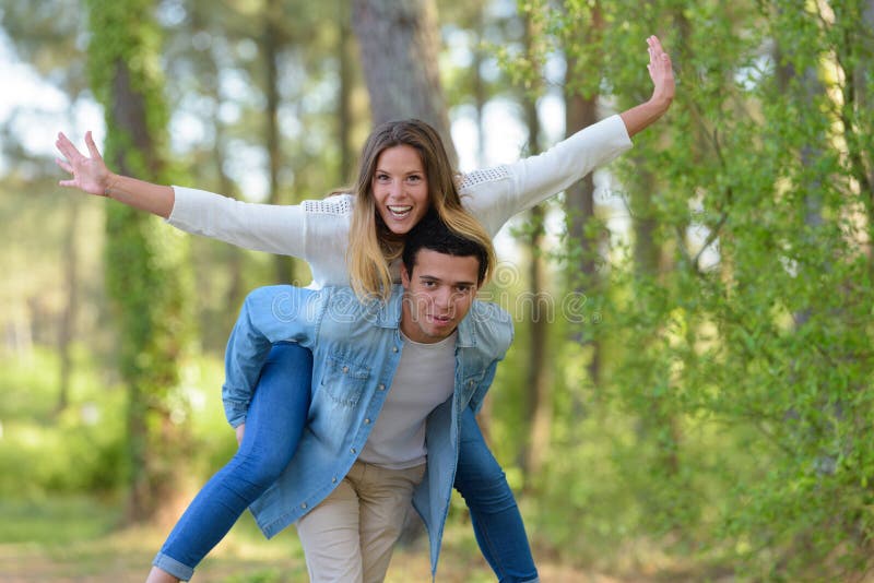 Woman and man having fun stock image. Image of pretty - 302962409