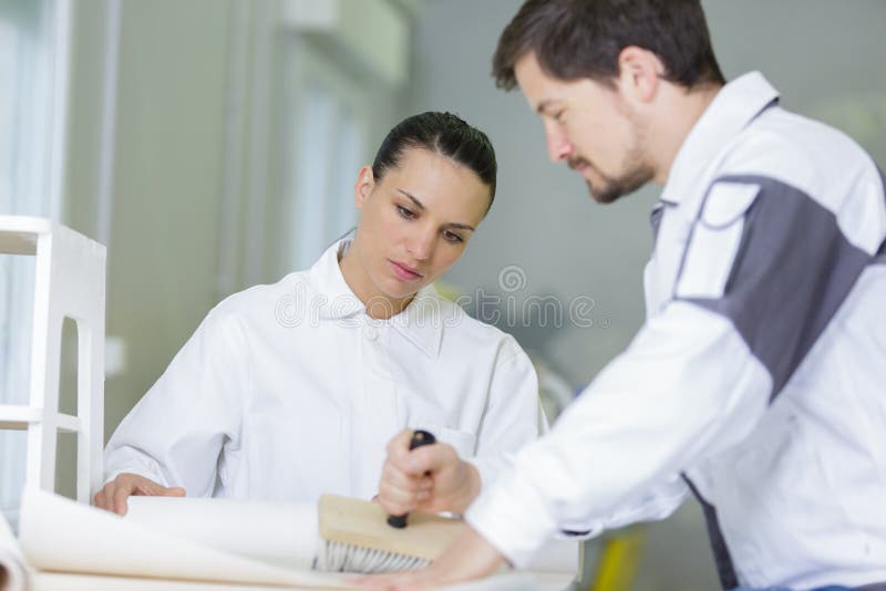 Woman and Man Working in Painting Project Stock Photo - Image of tools ...