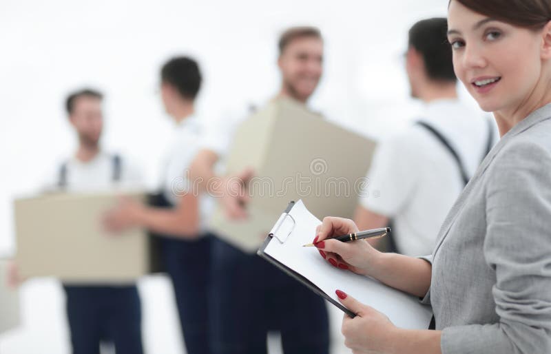 Businessman with Documents, Creating a Stack of Cardboard Boxes. Stock ...