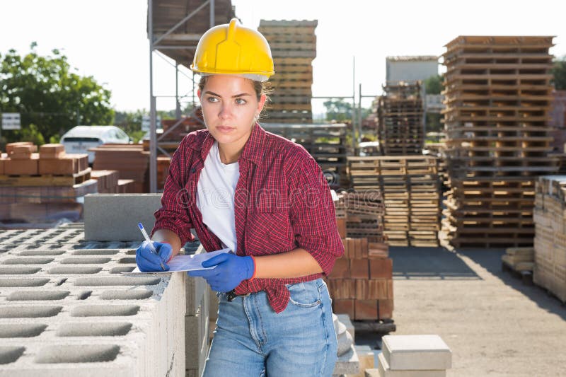 Woman Manager Leads the Accounting of Materials at Construction Site ...